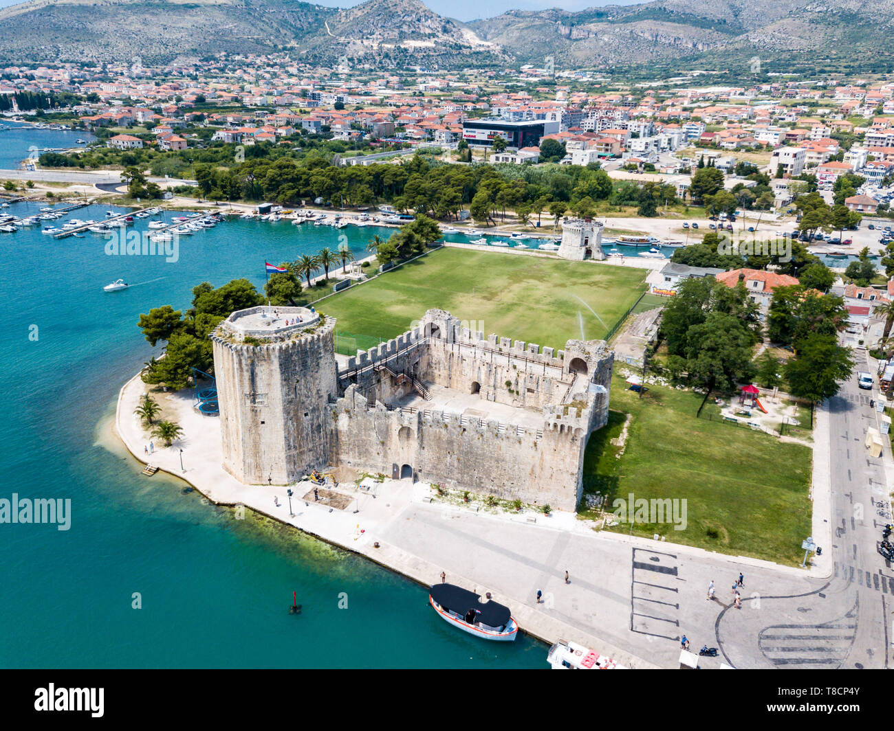 Stone Kamerlengo Castle, medieval city walls and yachts marina. Aerial ...