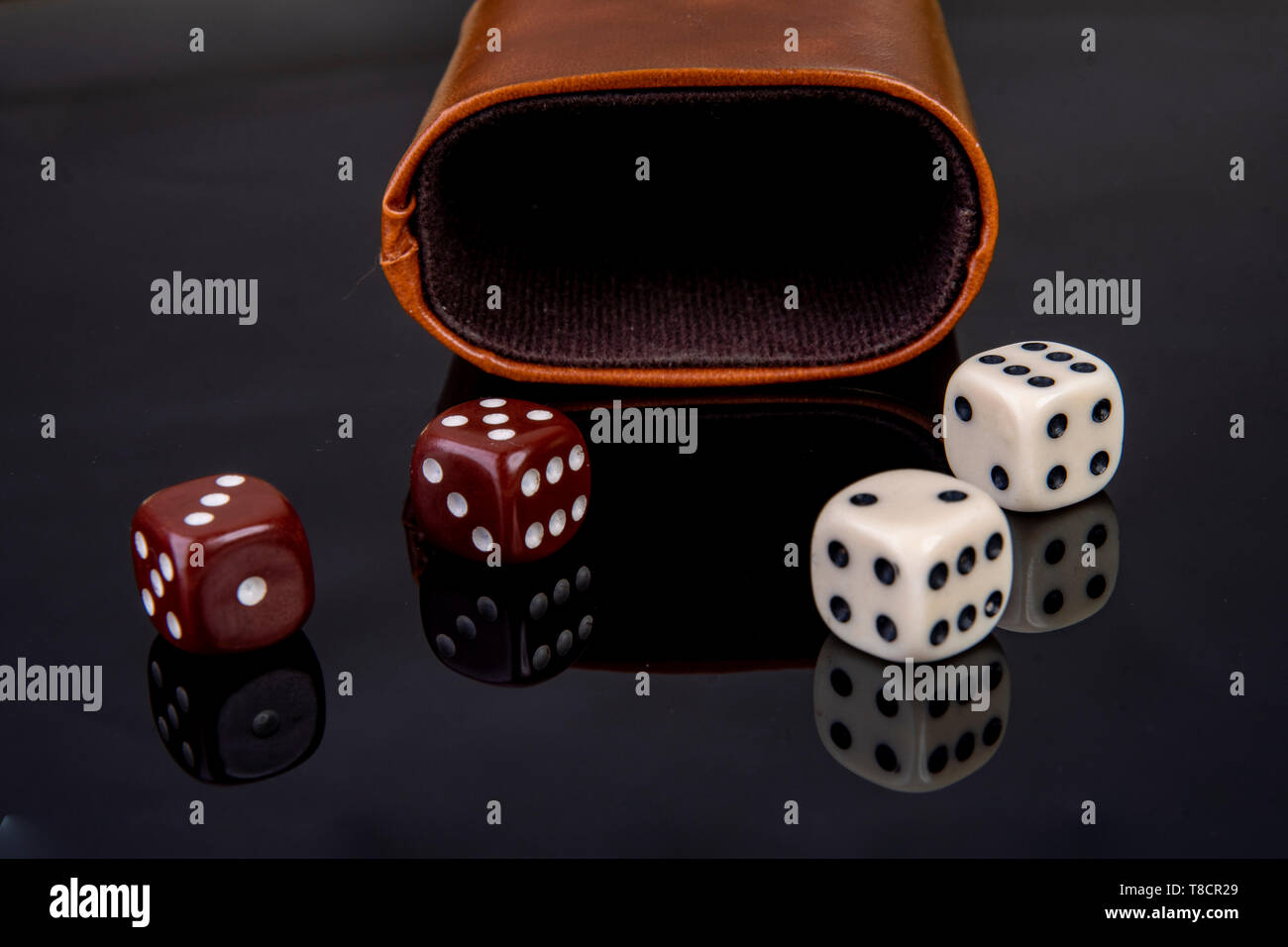 Leather dice cup hi-res stock photography and images - Alamy