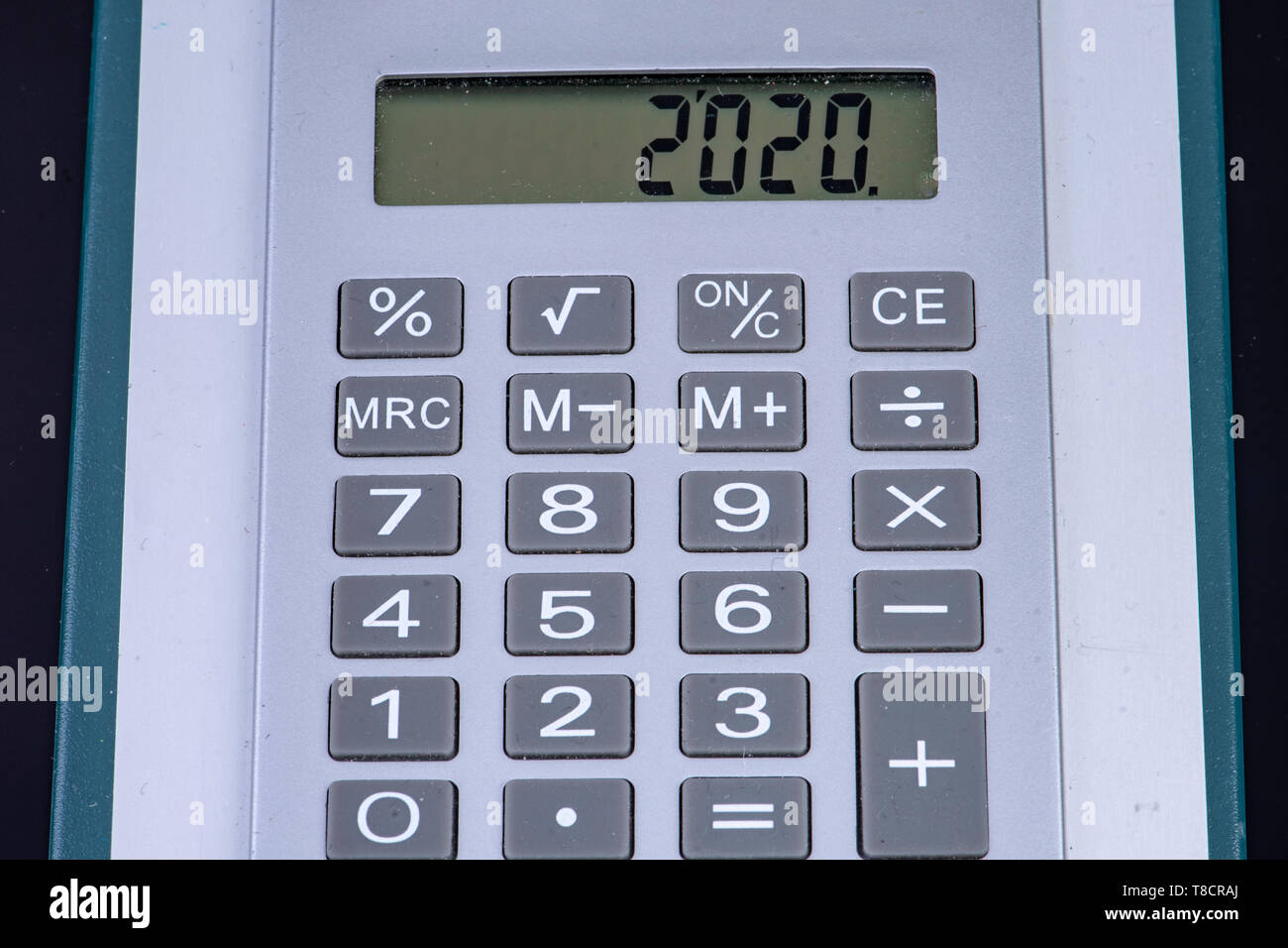 Pocket calculator with the year 2020 on the display Turn of the year ...