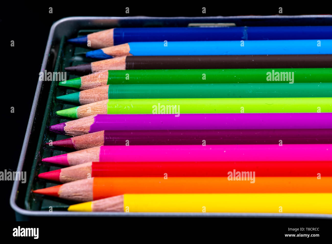 many colorful wooden pencils in very beautiful bright colors side by ...
