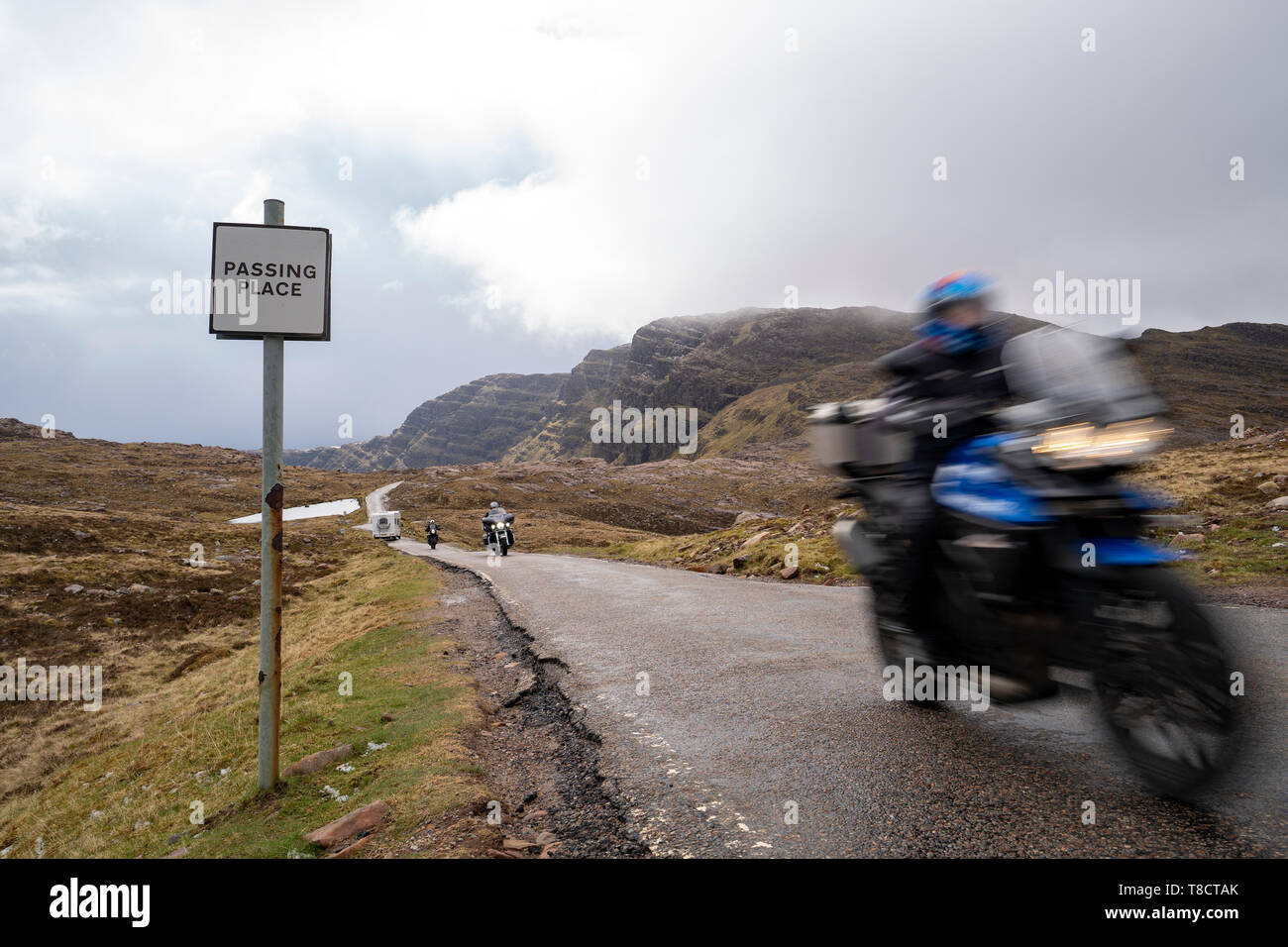 View of motorcycles on single track road on Bealach na Ba pass on ...