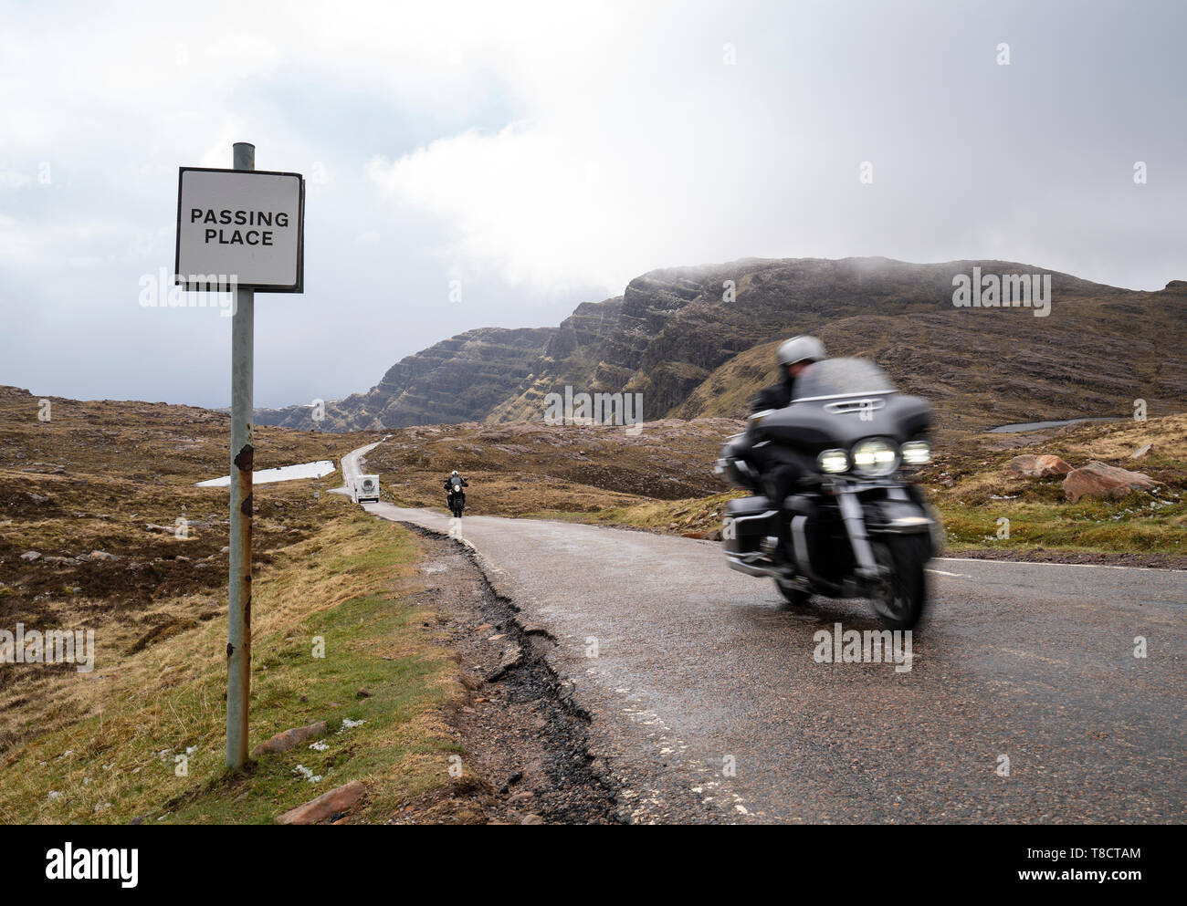 View of motorcycles on single track road on Bealach na Ba pass on ...