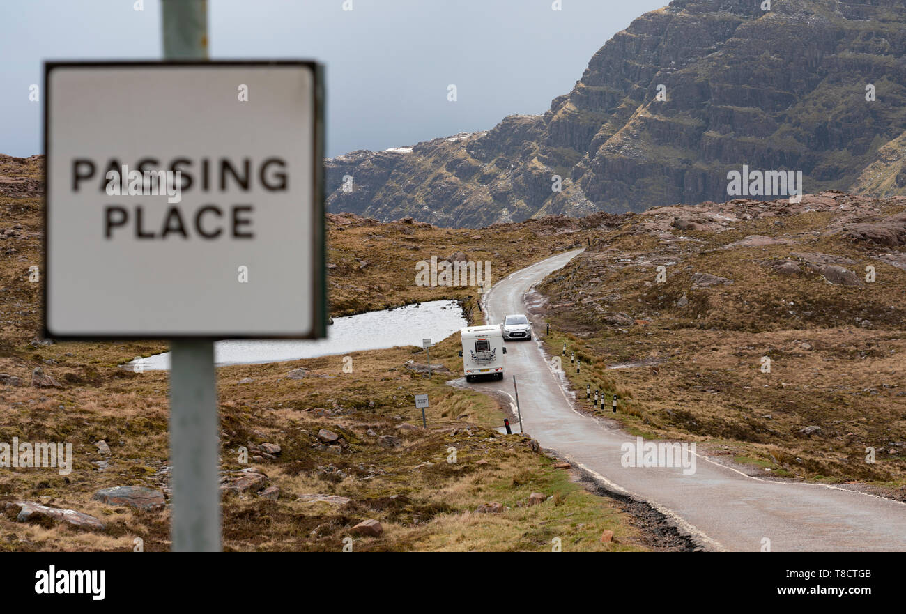 View of single track road and passing place on Bealach na Ba pass on ...