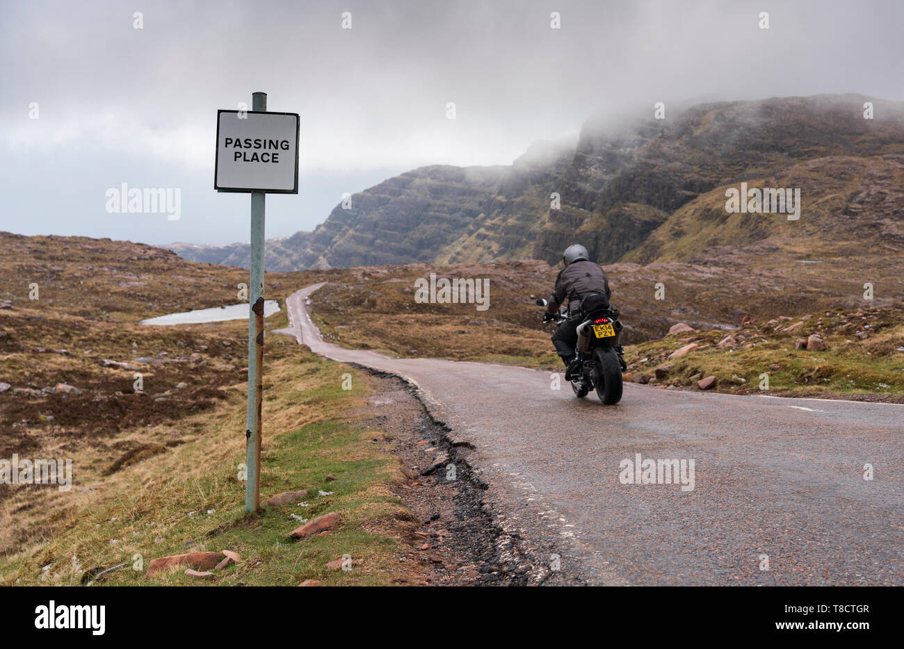View of single track road and passing place on Bealach na Ba pass on ...