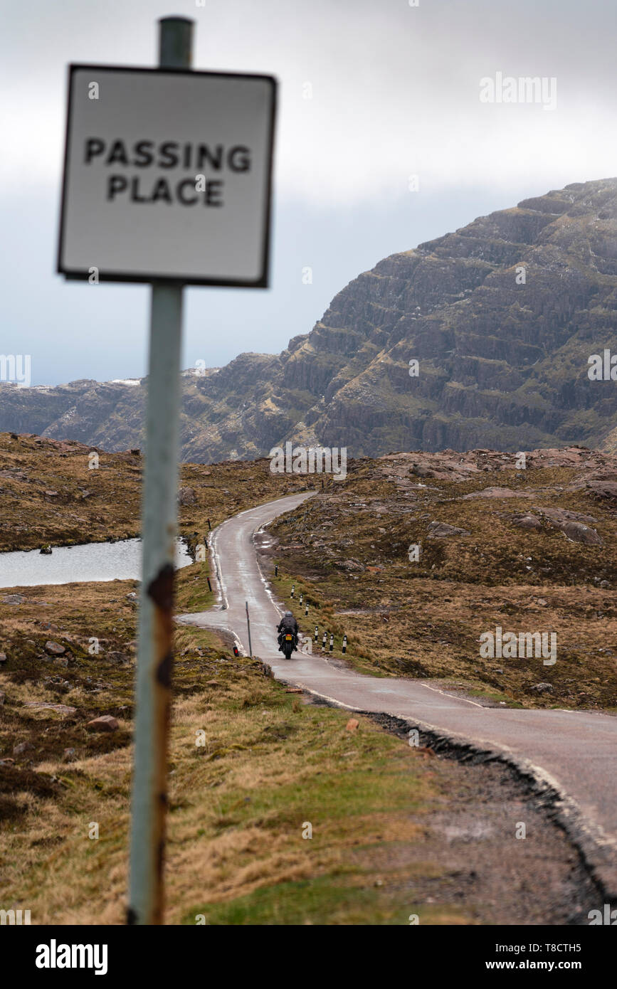 View of single track road and passing place on Bealach na Ba pass on ...