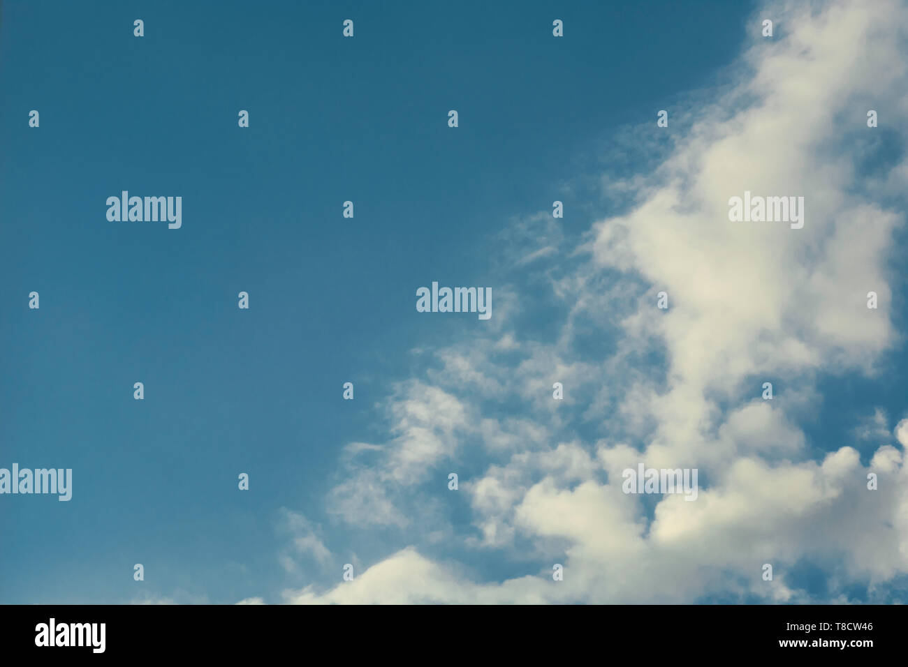fluffy white cloud in blue sky Stock Photo - Alamy