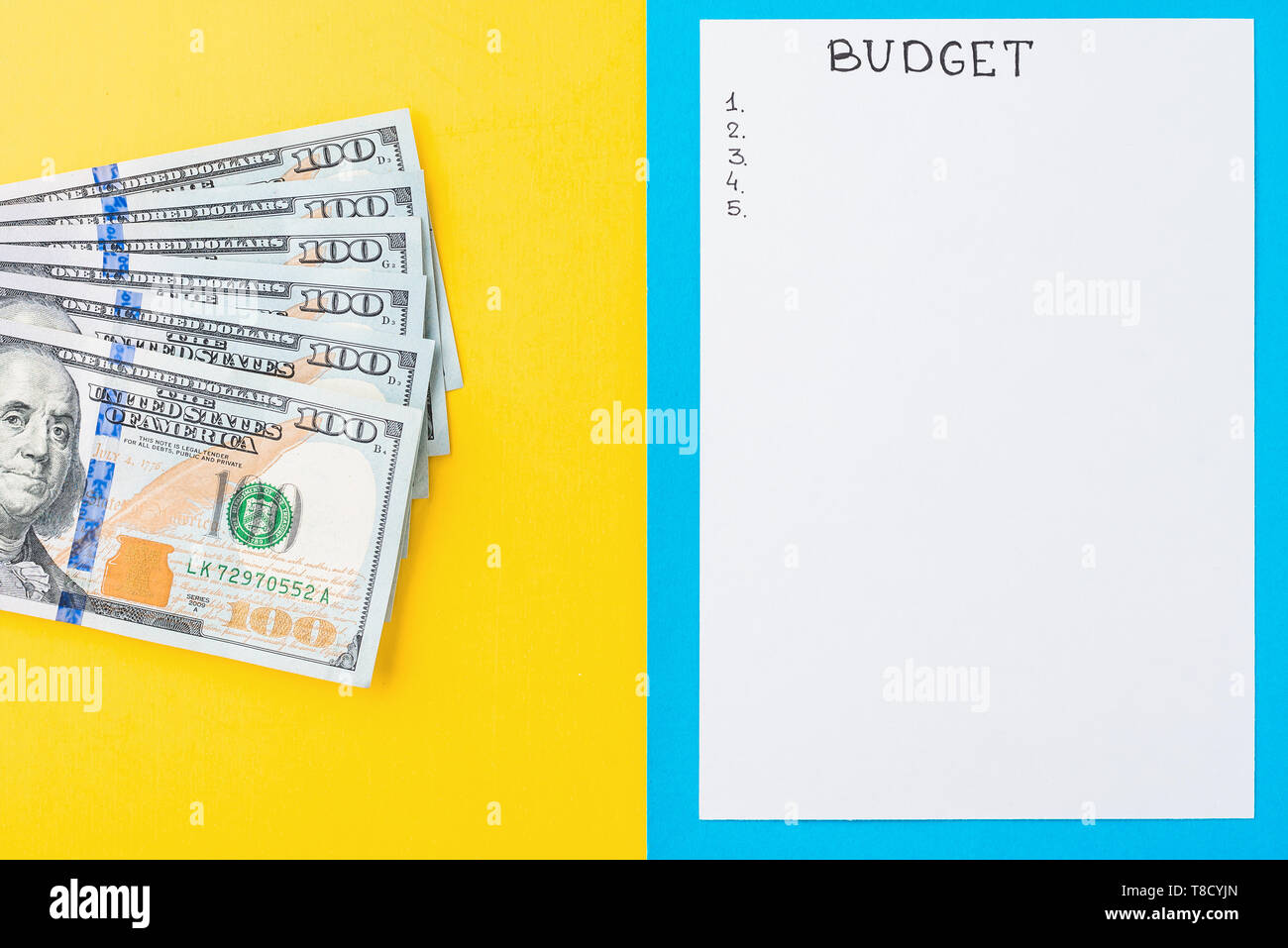 Planning budget concept. Notepad with word budget and dollar bills on ...