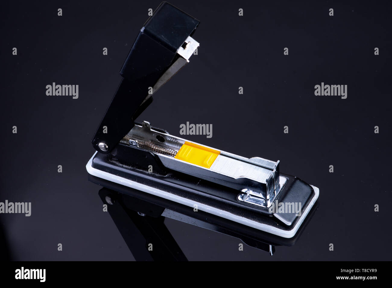 Office tacker opened with tacker staples with yellow plastic Stock ...