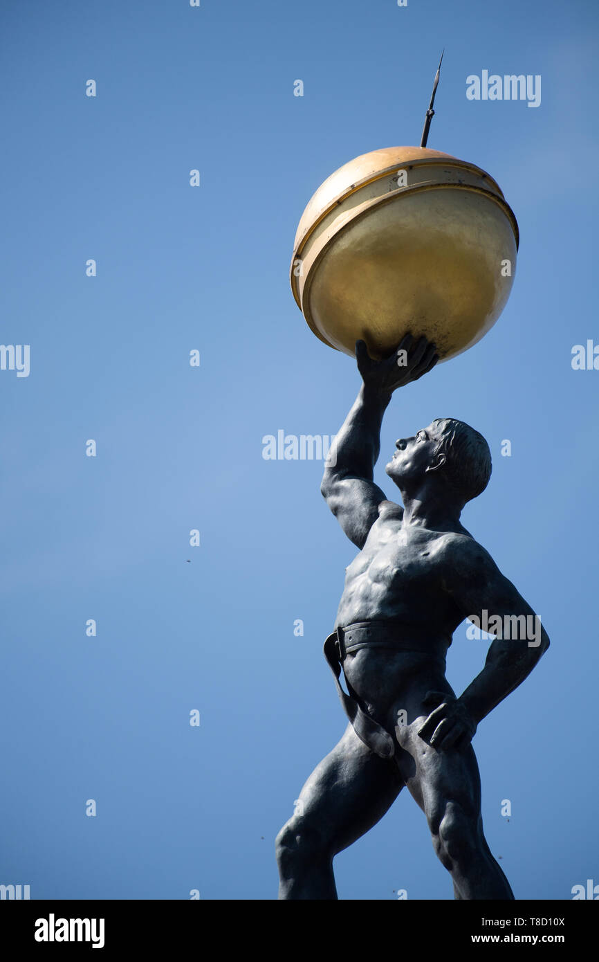 Statue of Atlas on the top of dome of Neoclassical palace by Stanislaw ...