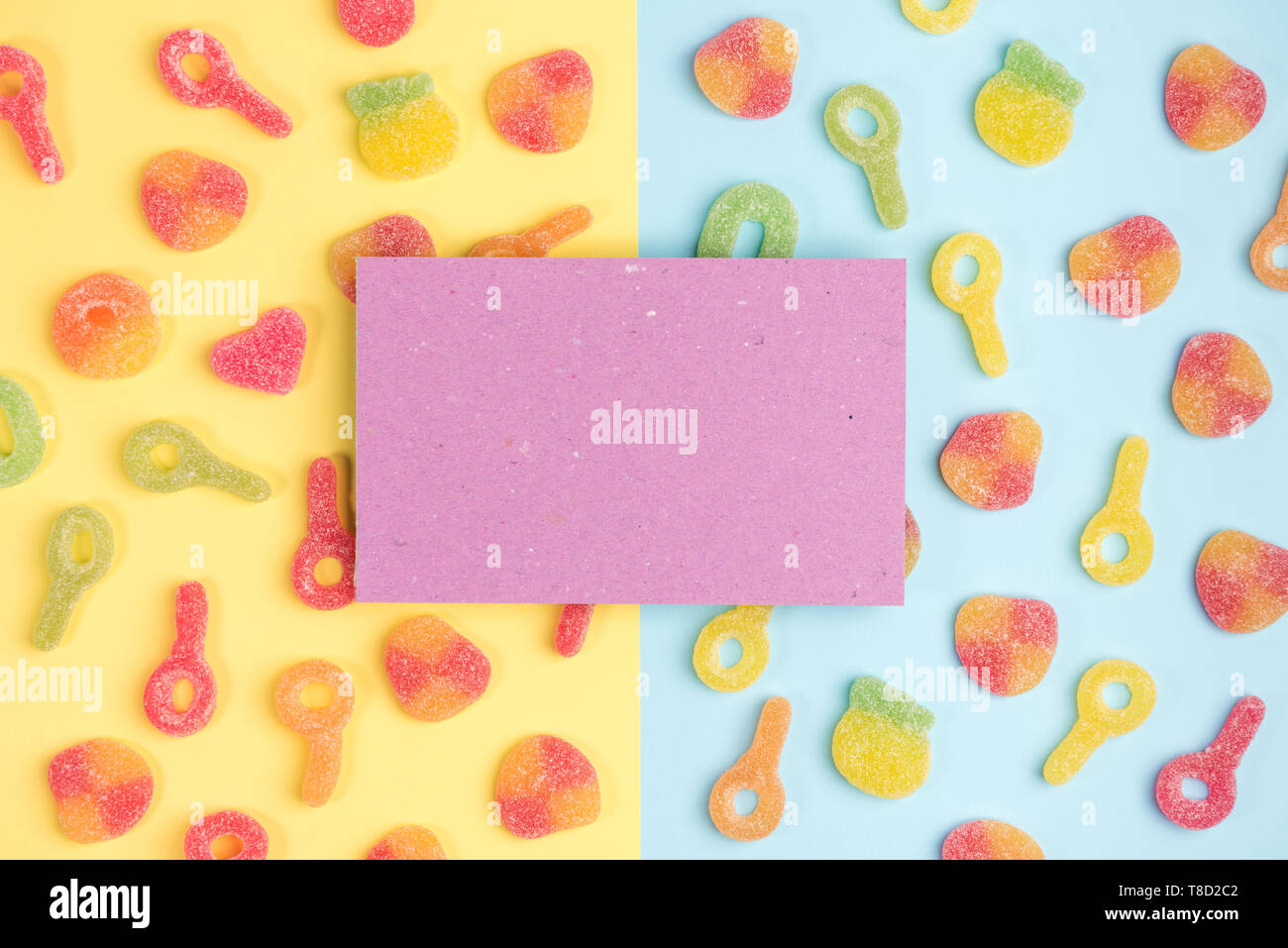 Blank sheet of paper on background of gummy candies. Multicolored ...