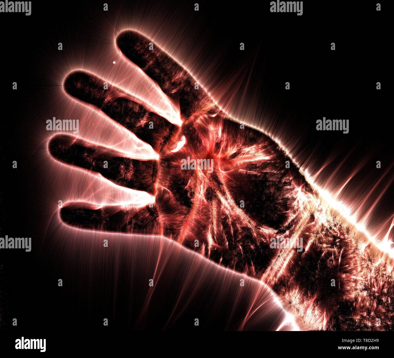 Kirlian aura photography of a glowing human male hand showing different ...