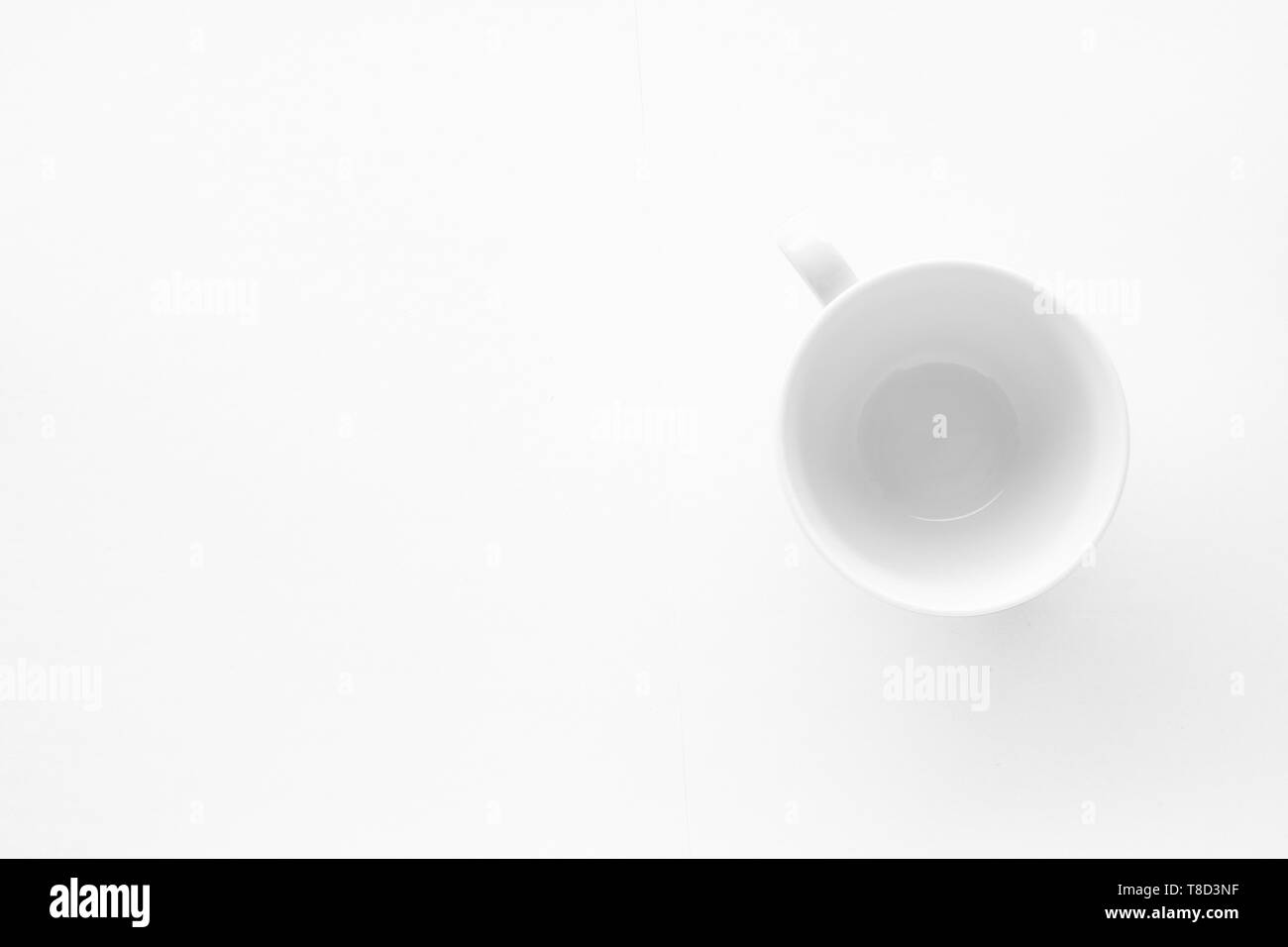 Kitchen, dishware design and drink concept - Empty cup and saucer ...