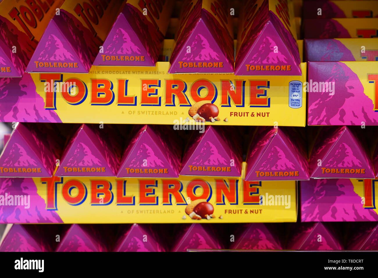 HEATHROW, ENGLAND -3 APR 2019- View of packages of Toblerone, a Swiss ...