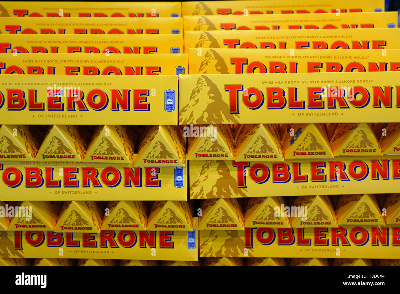 HEATHROW, ENGLAND -3 APR 2019- View of packages of Toblerone, a Swiss ...