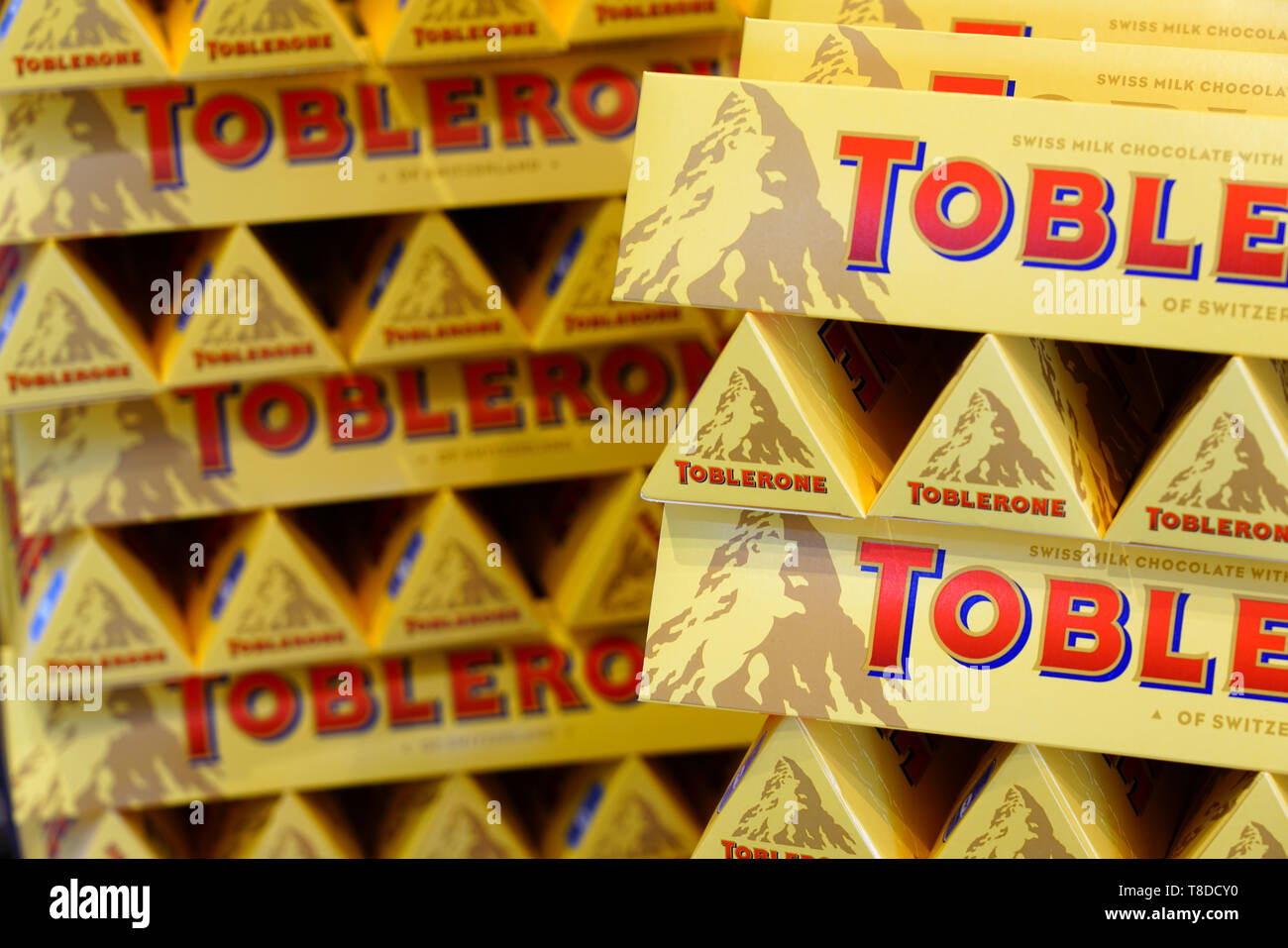 HEATHROW, ENGLAND -3 APR 2019- View of packages of Toblerone, a Swiss ...