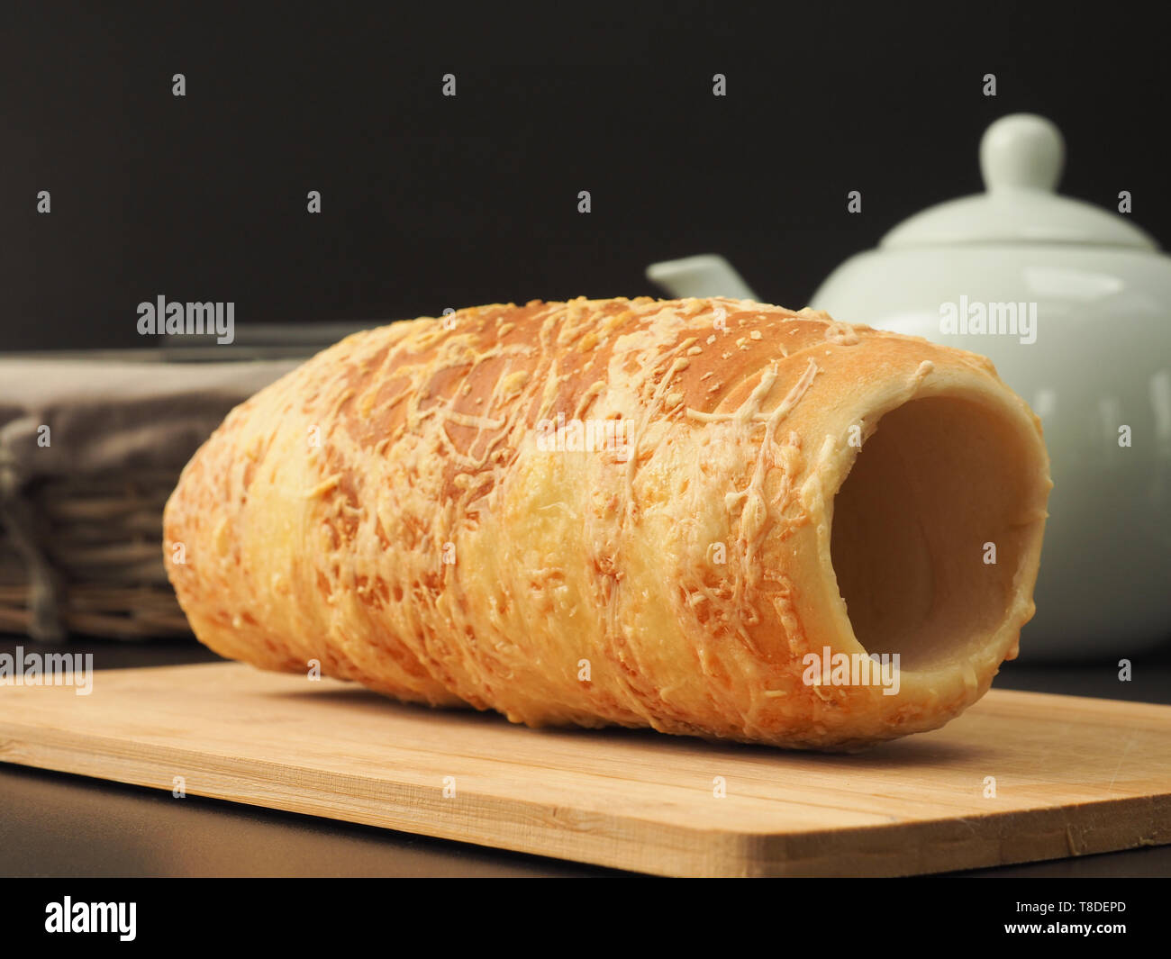 Tasty spit cake with cheese on a cutting board Stock Photo - Alamy