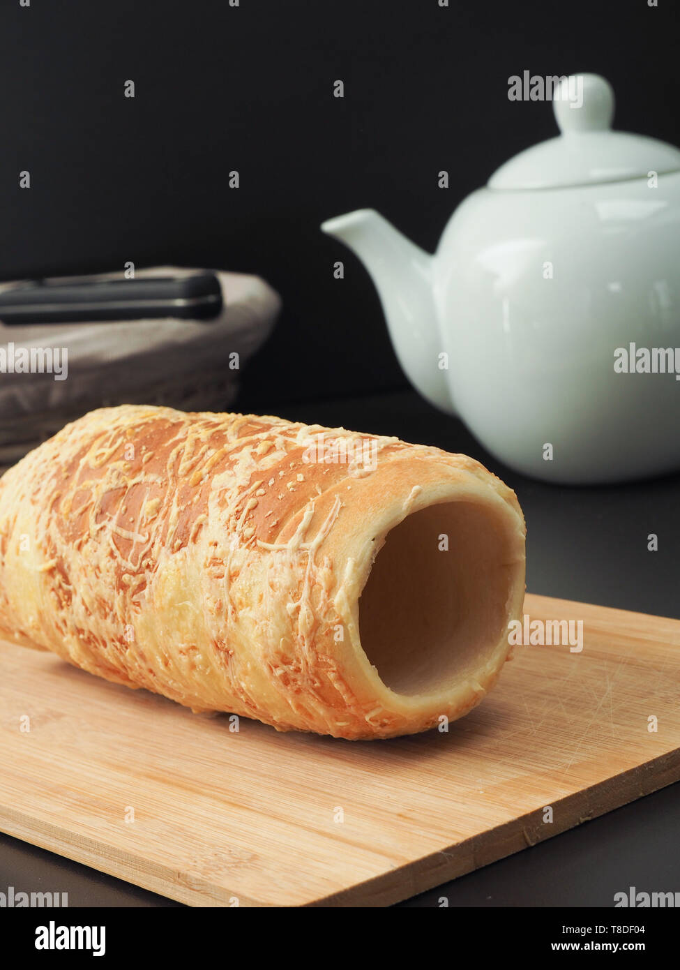 Tasty spit cake with cheese on a cutting board Stock Photo - Alamy