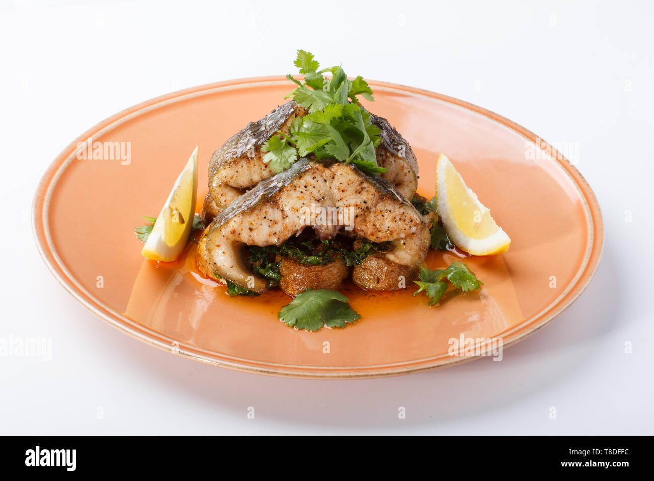 Oven Roasted Sturgeon fish served with Potatoes, Lime, Ghee and ...