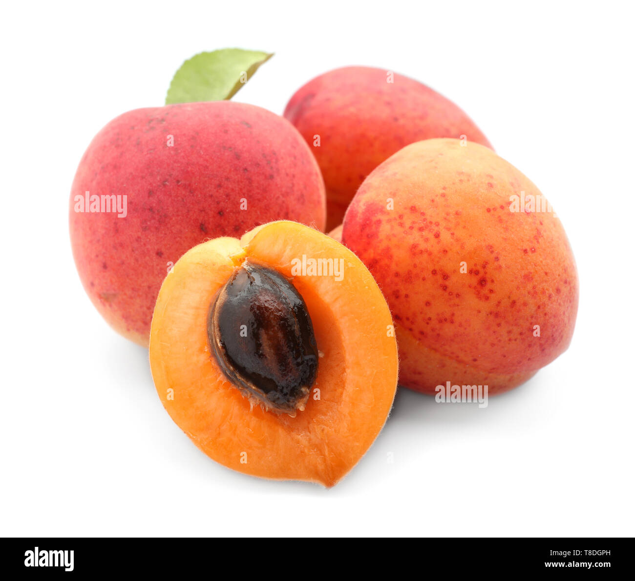 Ripe sweet apricots on white background Stock Photo - Alamy