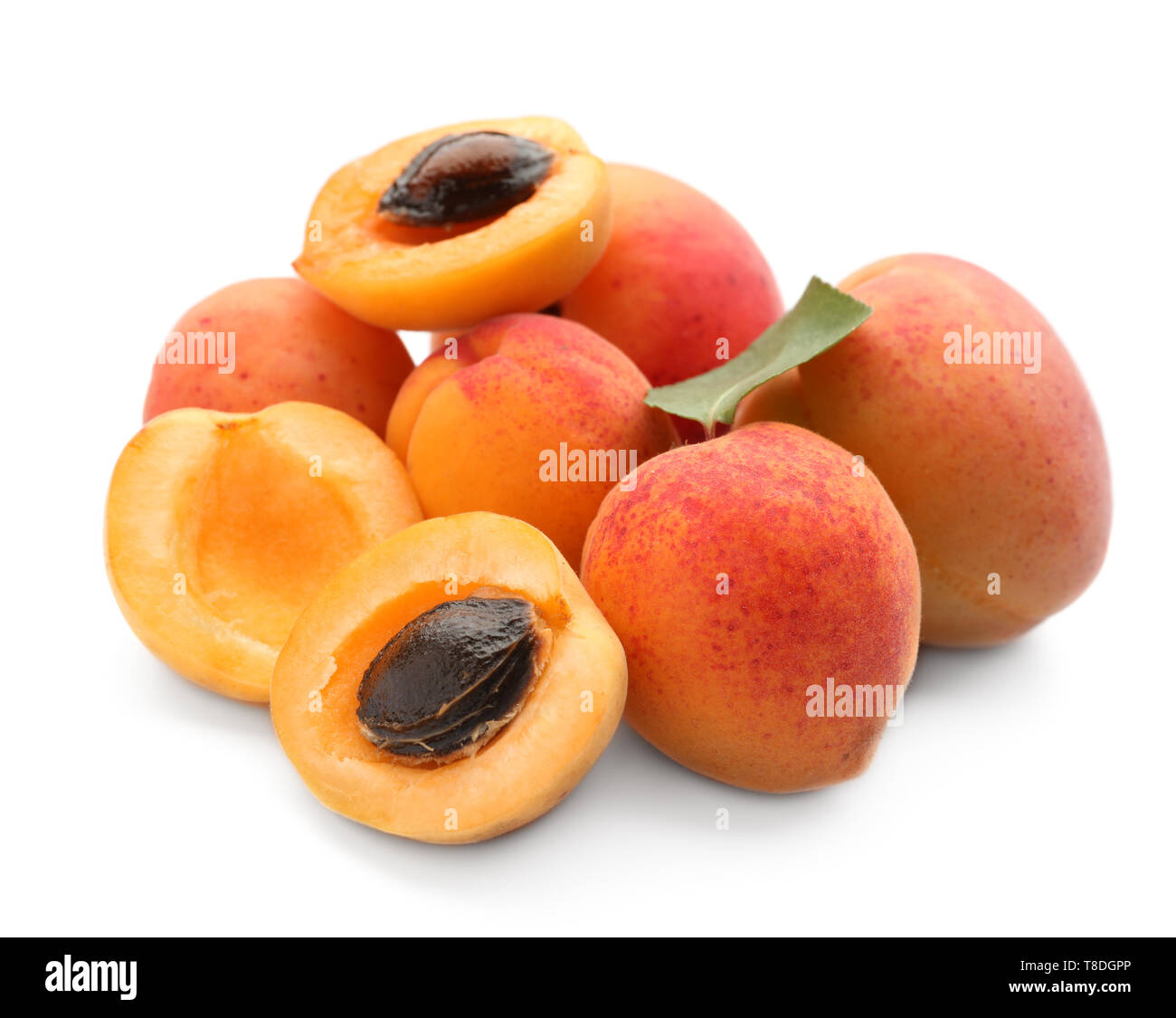 Ripe sweet apricots on white background Stock Photo - Alamy