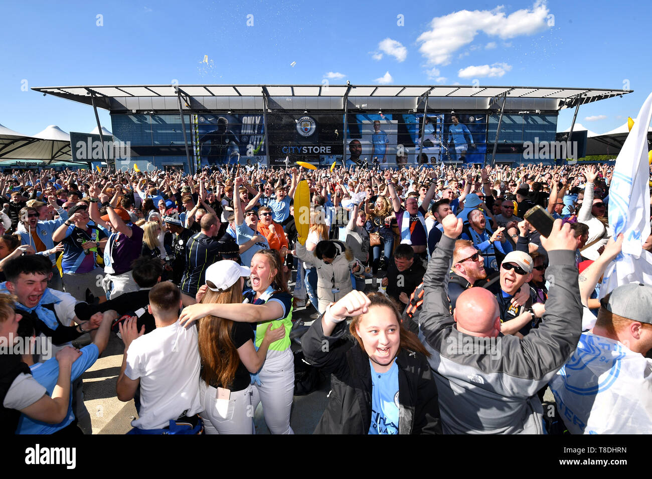 Manchester City fans celebrate their team's fourth goal of the game at ...