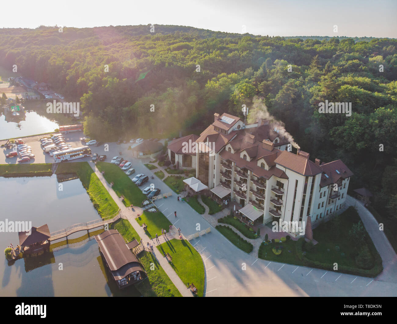 aerial view of resort near lake forest around. sunny evening Stock ...