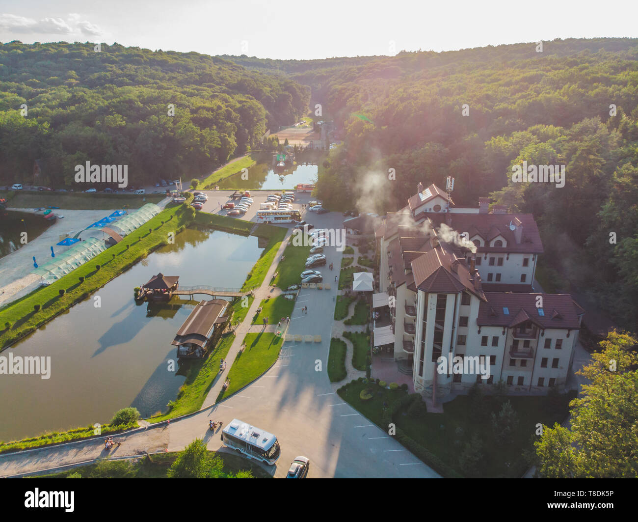 aerial view of resort near lake forest around. sunny evening Stock ...