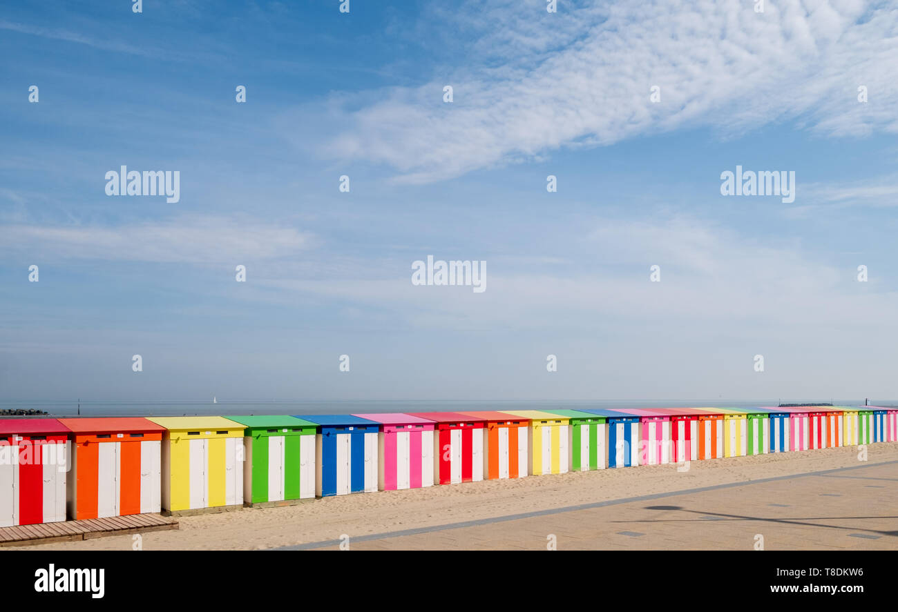 Dunkerque, France: Row of brightly coloured striped beach cabins on the ...