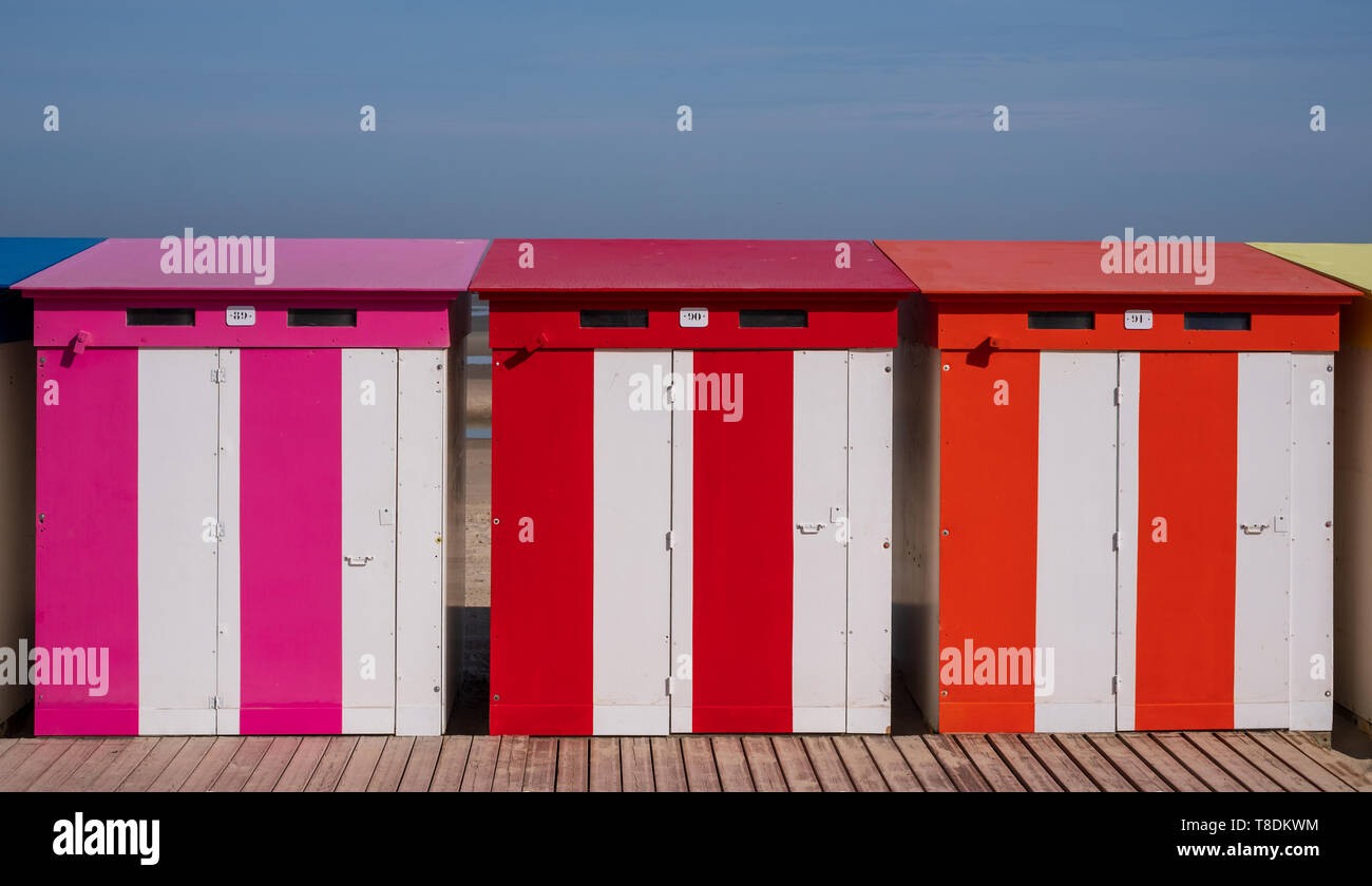 Dunkerque, France: Row of brightly coloured striped beach cabins on the ...