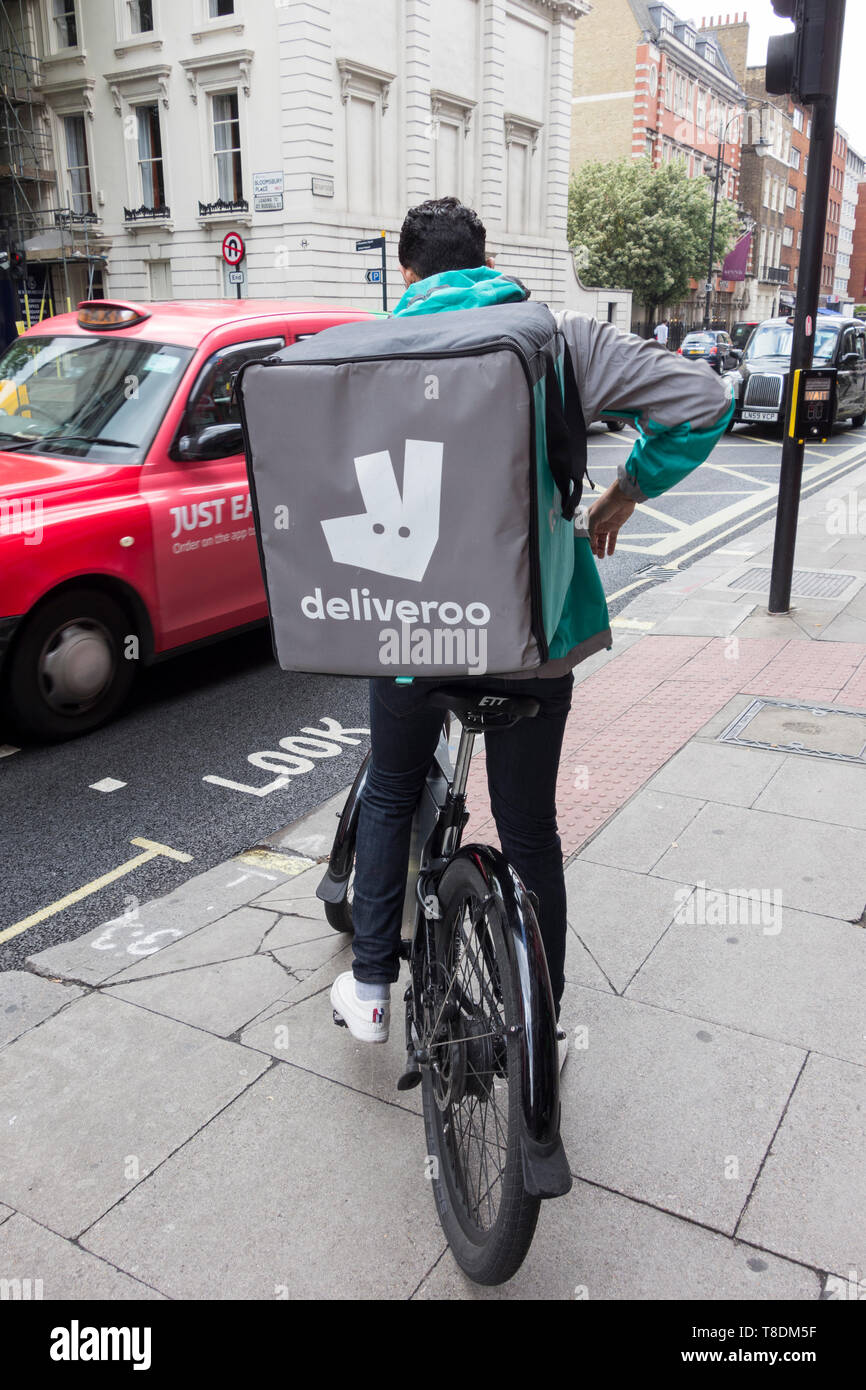 Male Deliveroo cyclist and Just Eat taxi come together on Southampton ...