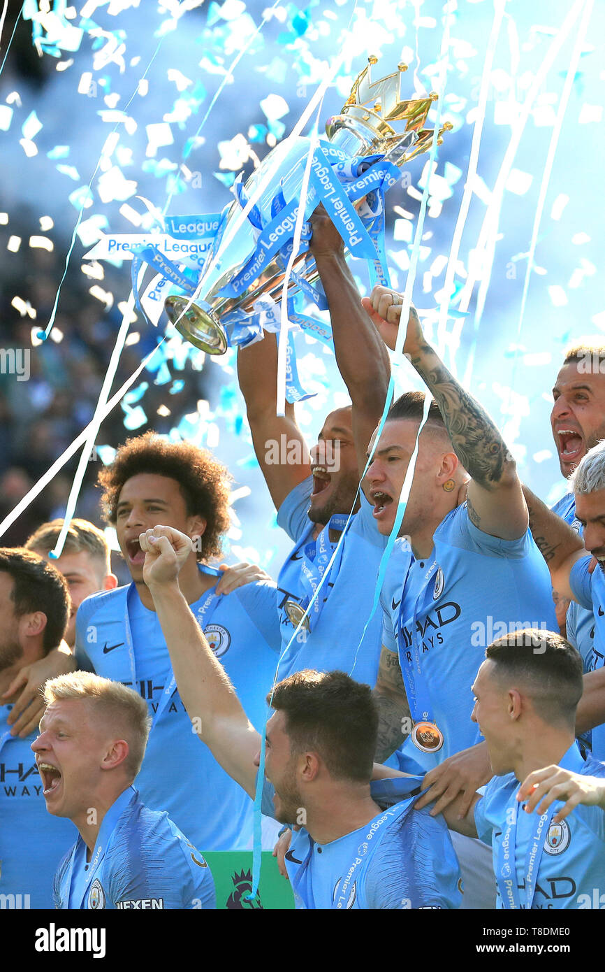 Manchester City's Vincent Kompany celebrates with the trophy after the ...