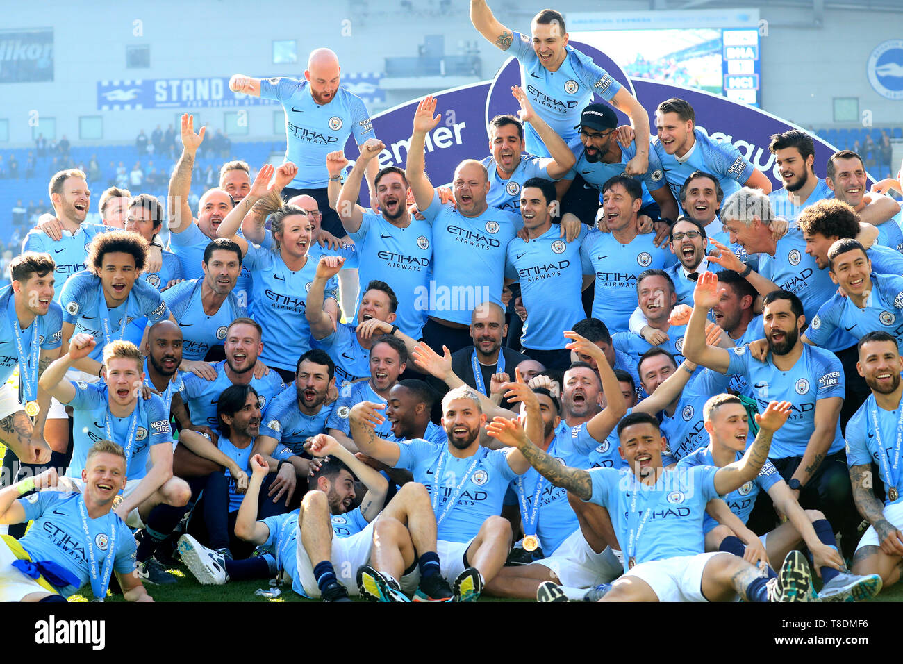 Manchester City players and staff celebrates winning the title after ...