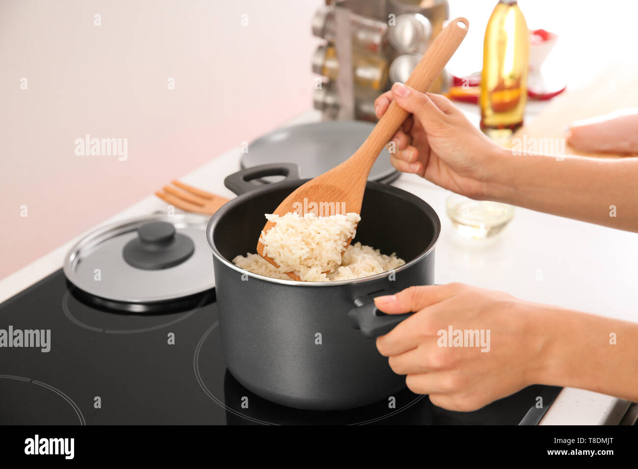 Stirring rice cooker hi-res stock photography and images - Alamy