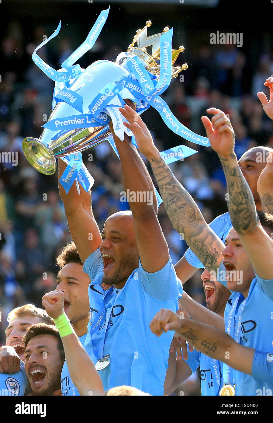 Manchester City's Vincent Kompany celebrates with the trophy during the ...