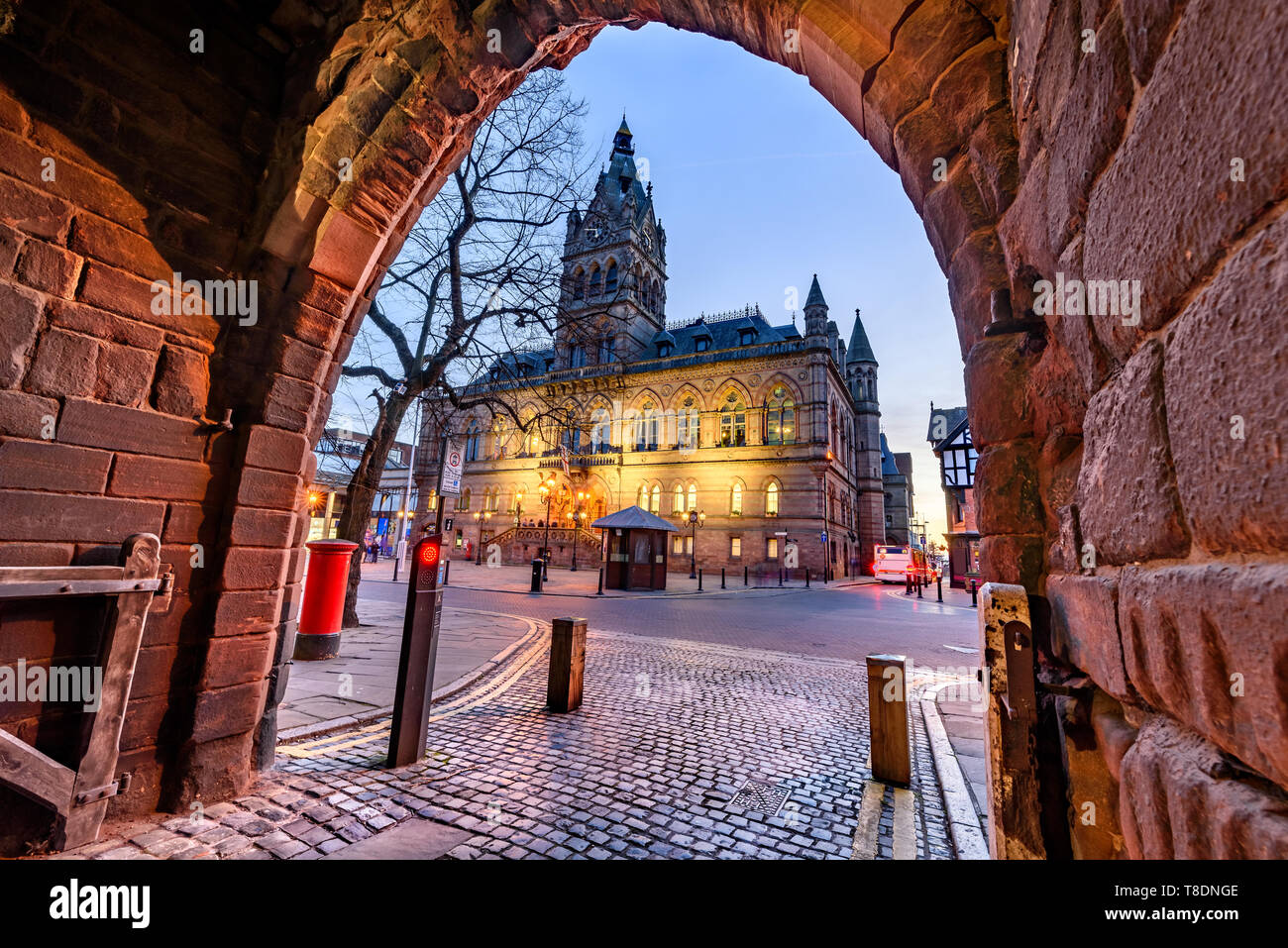 The grey and red sandstone, Gothic style Town Hall with its tower and ...