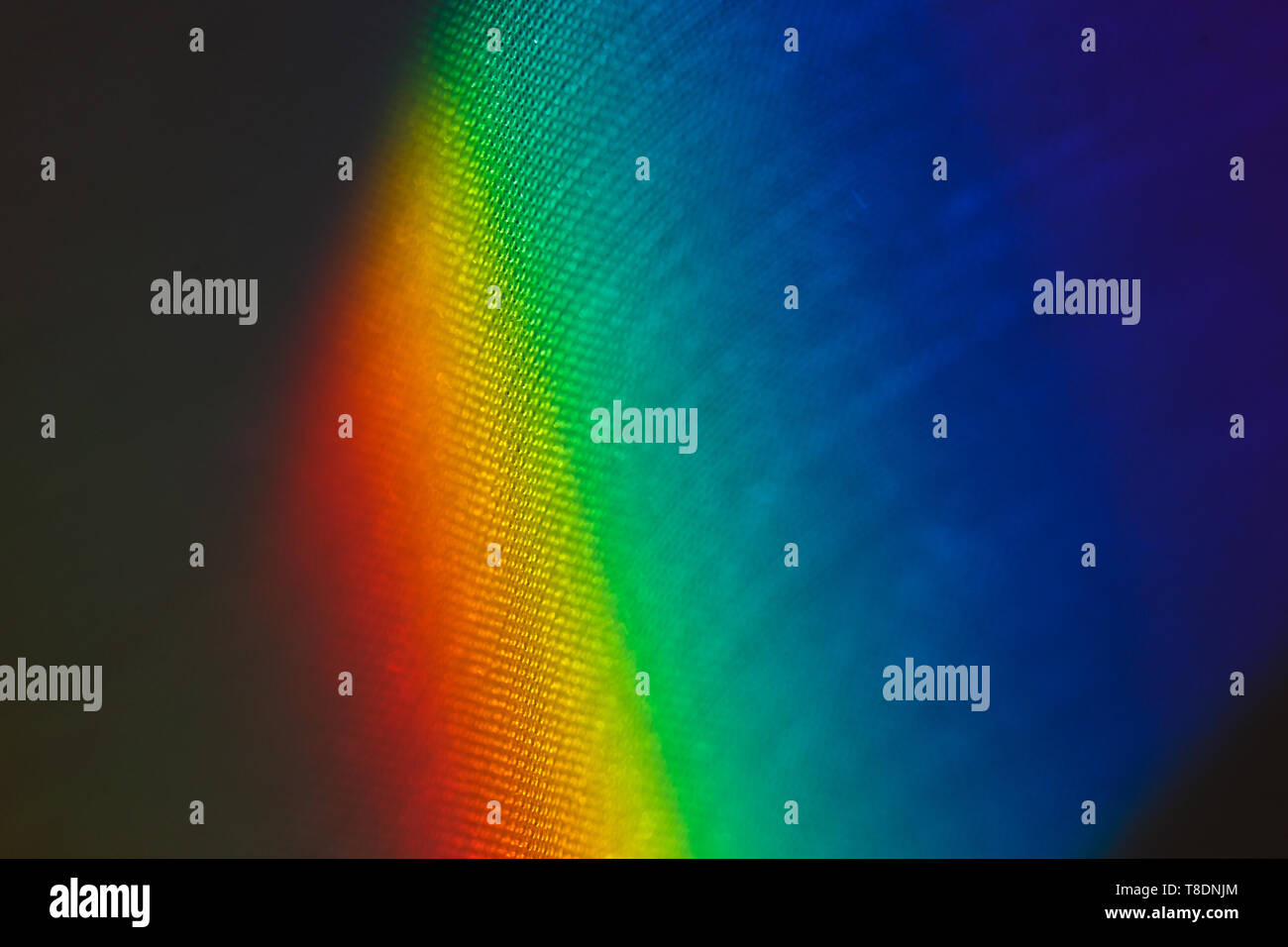 Spectral gradient of sunlight coming through a prism Stock Photo - Alamy