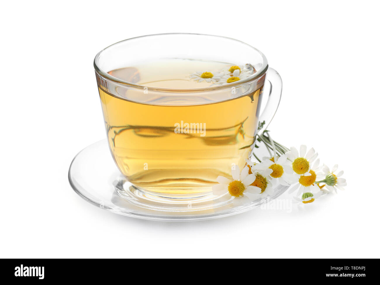 Glass cup of delicious camomile tea on white background Stock Photo - Alamy