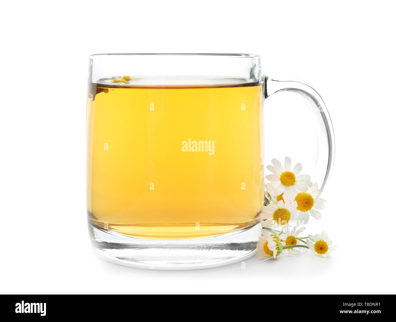 Glass cup of delicious camomile tea on white background Stock Photo - Alamy