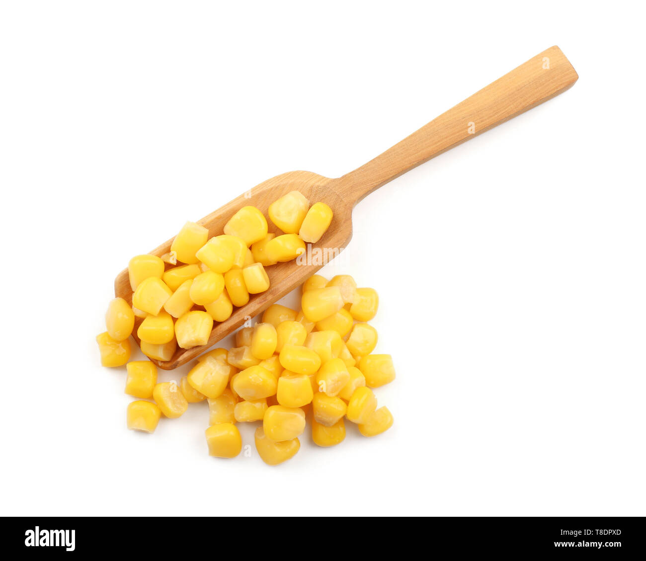 Scoop with tasty corn kernels on white background Stock Photo - Alamy