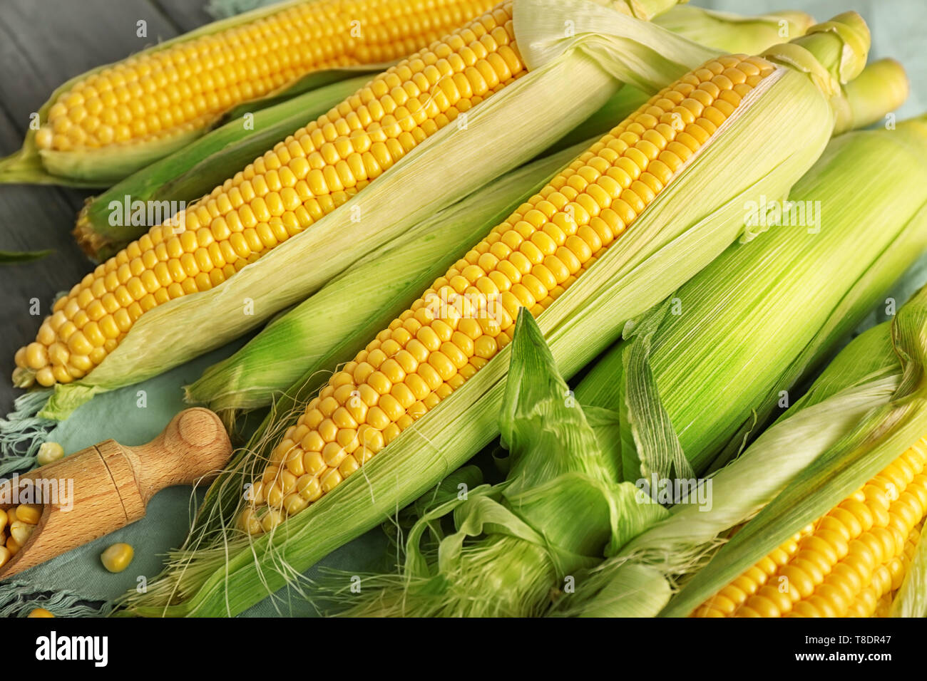 Fresh corn cobs on table Stock Photo - Alamy