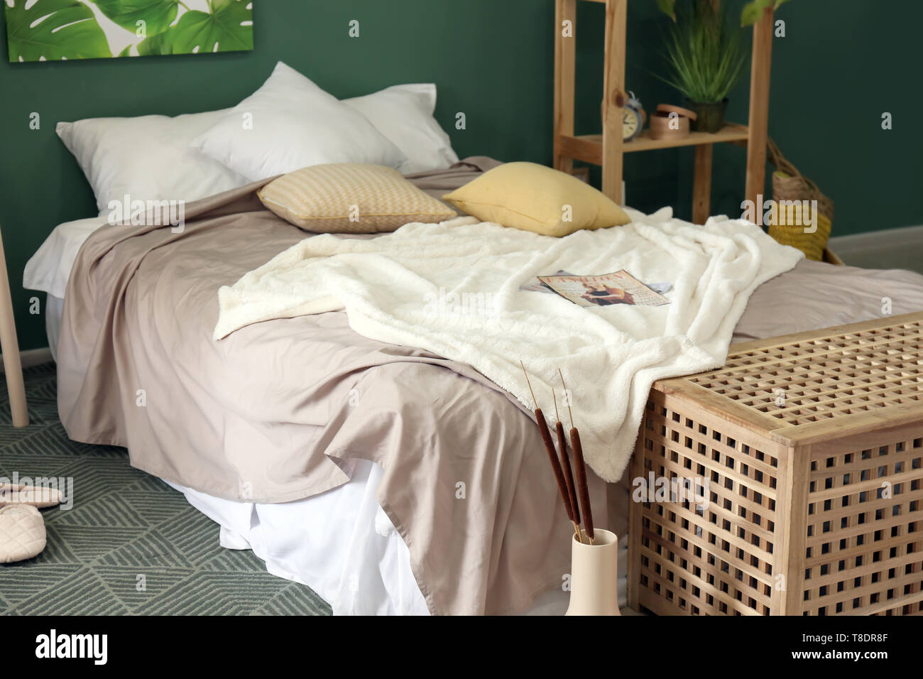 Big comfortable bed in stylish interior of room Stock Photo - Alamy