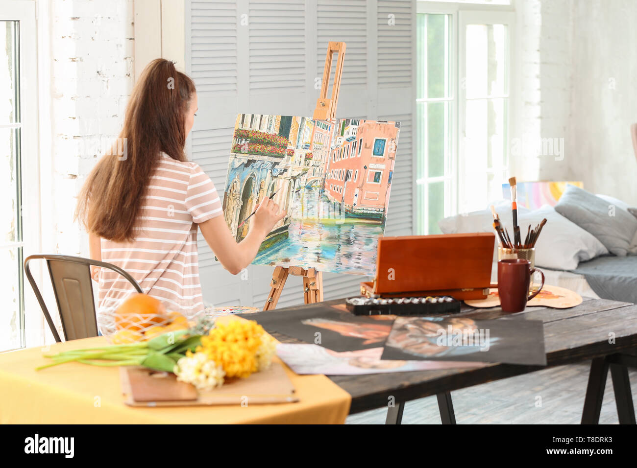 Artist female paints masterpiece sitting hi-res stock photography and ...