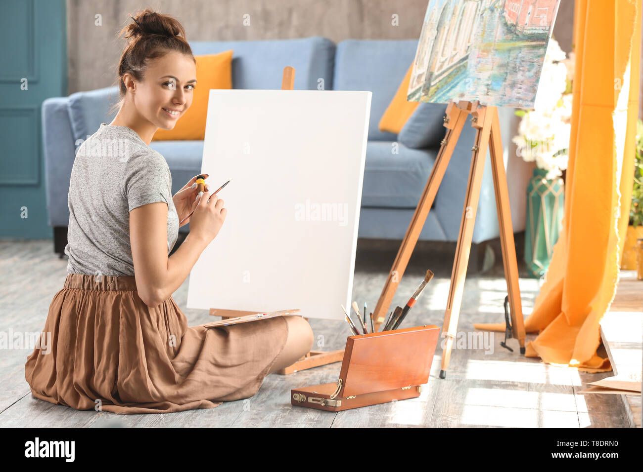 Artist female paints masterpiece sitting hi-res stock photography and ...