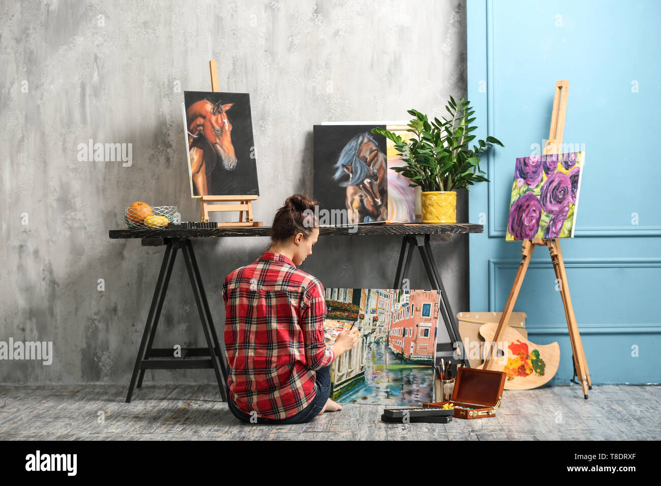 Artist female paints masterpiece sitting hi-res stock photography and ...