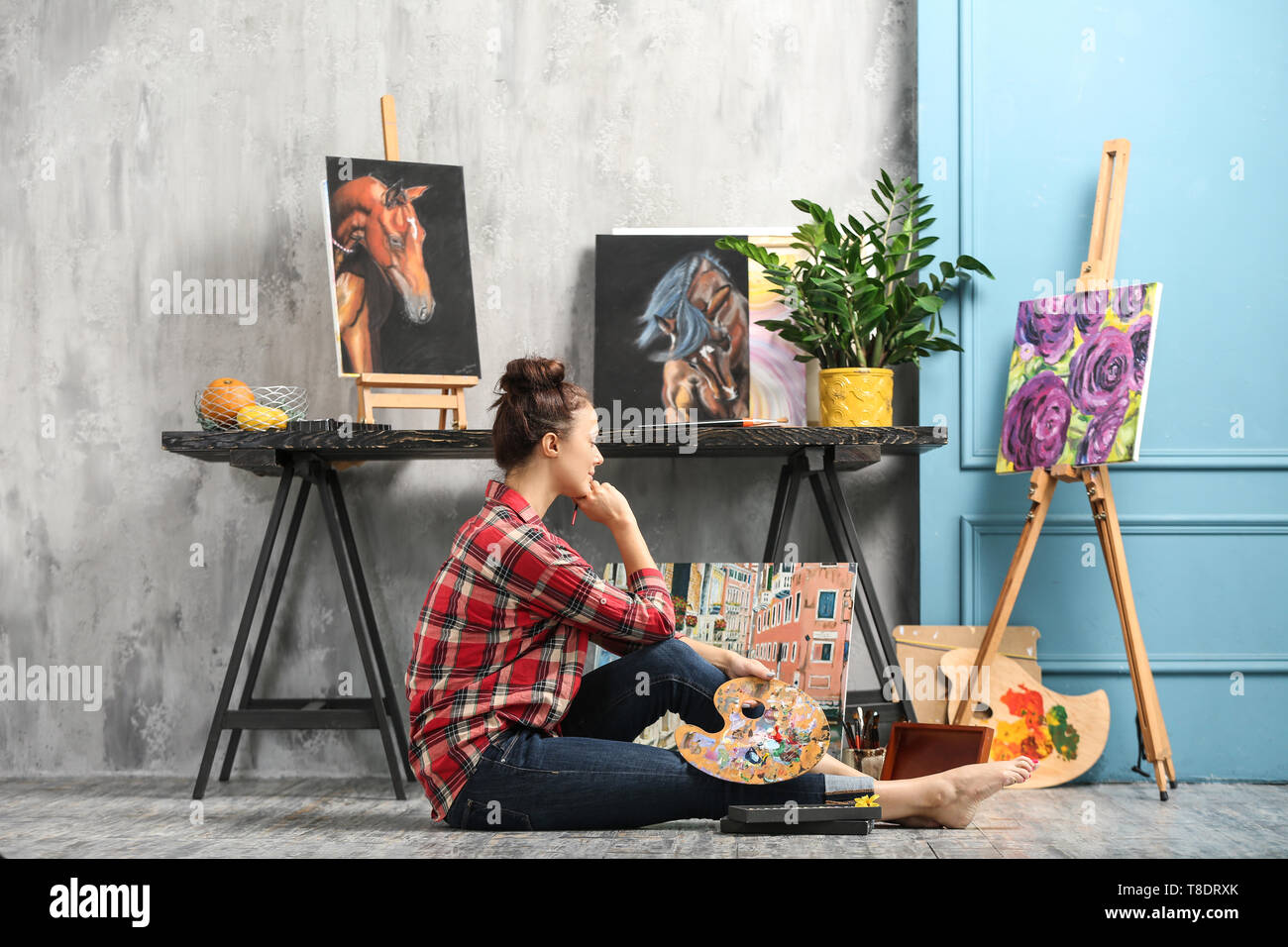 Artist female paints masterpiece sitting hi-res stock photography and ...