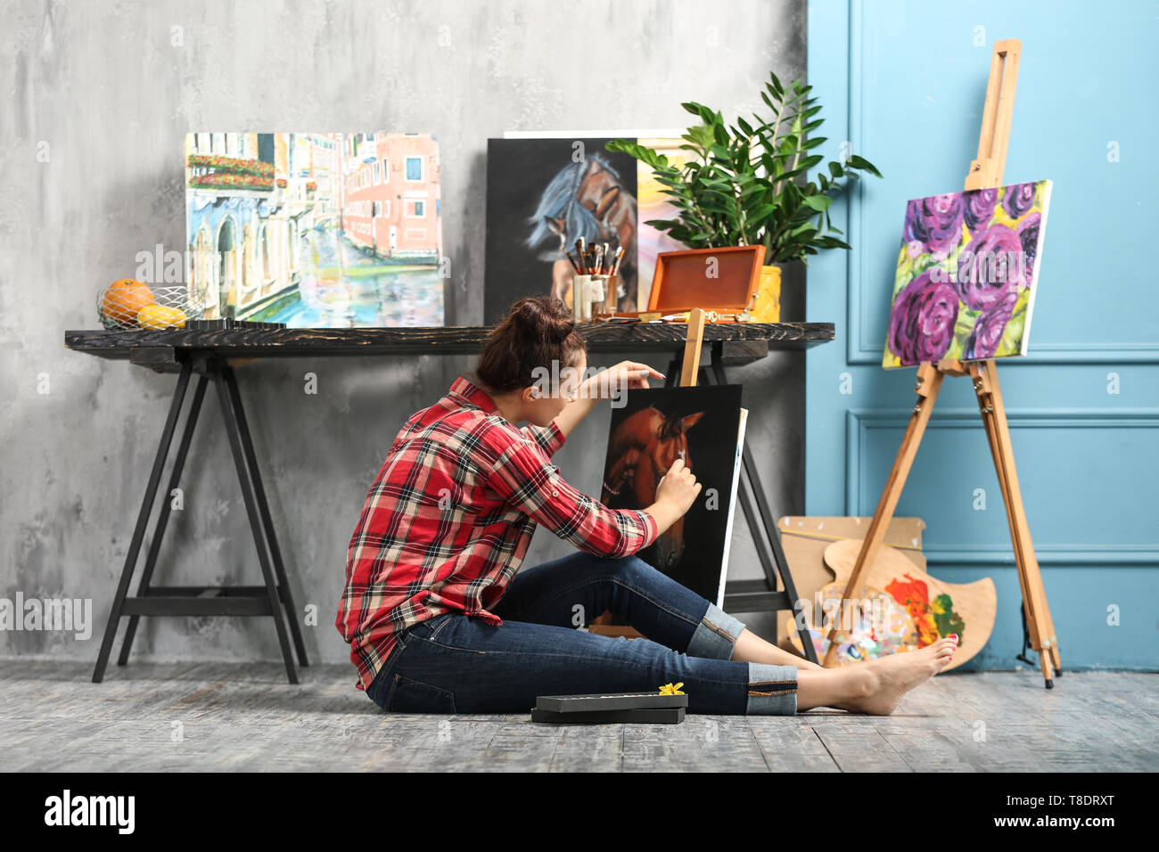 Artist female paints masterpiece sitting hi-res stock photography and ...