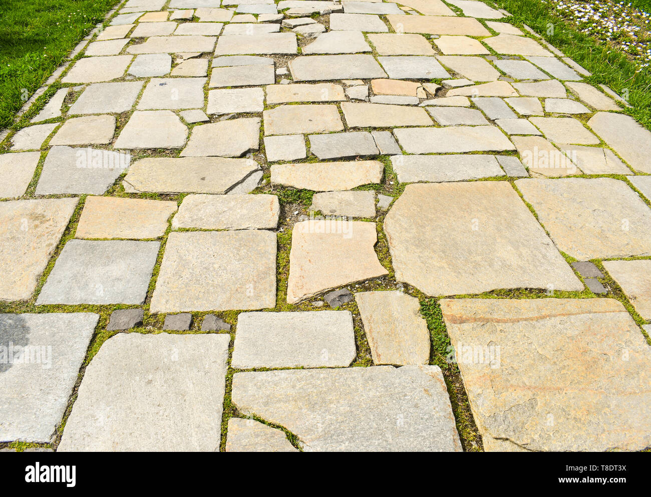 Stone blocks pavement in the city park.Pathway made with big ...