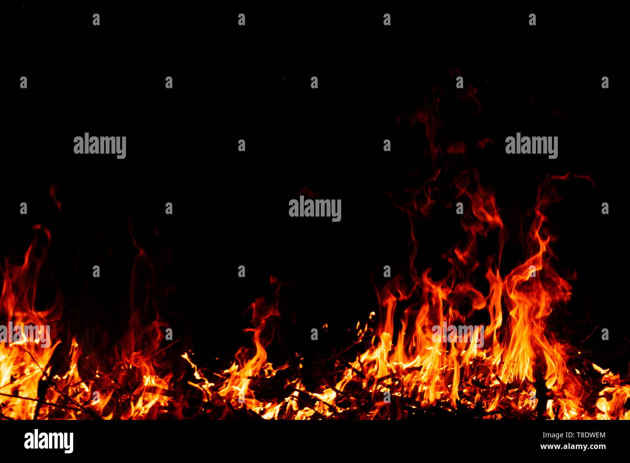 Fire on black background Stock Photo - Alamy