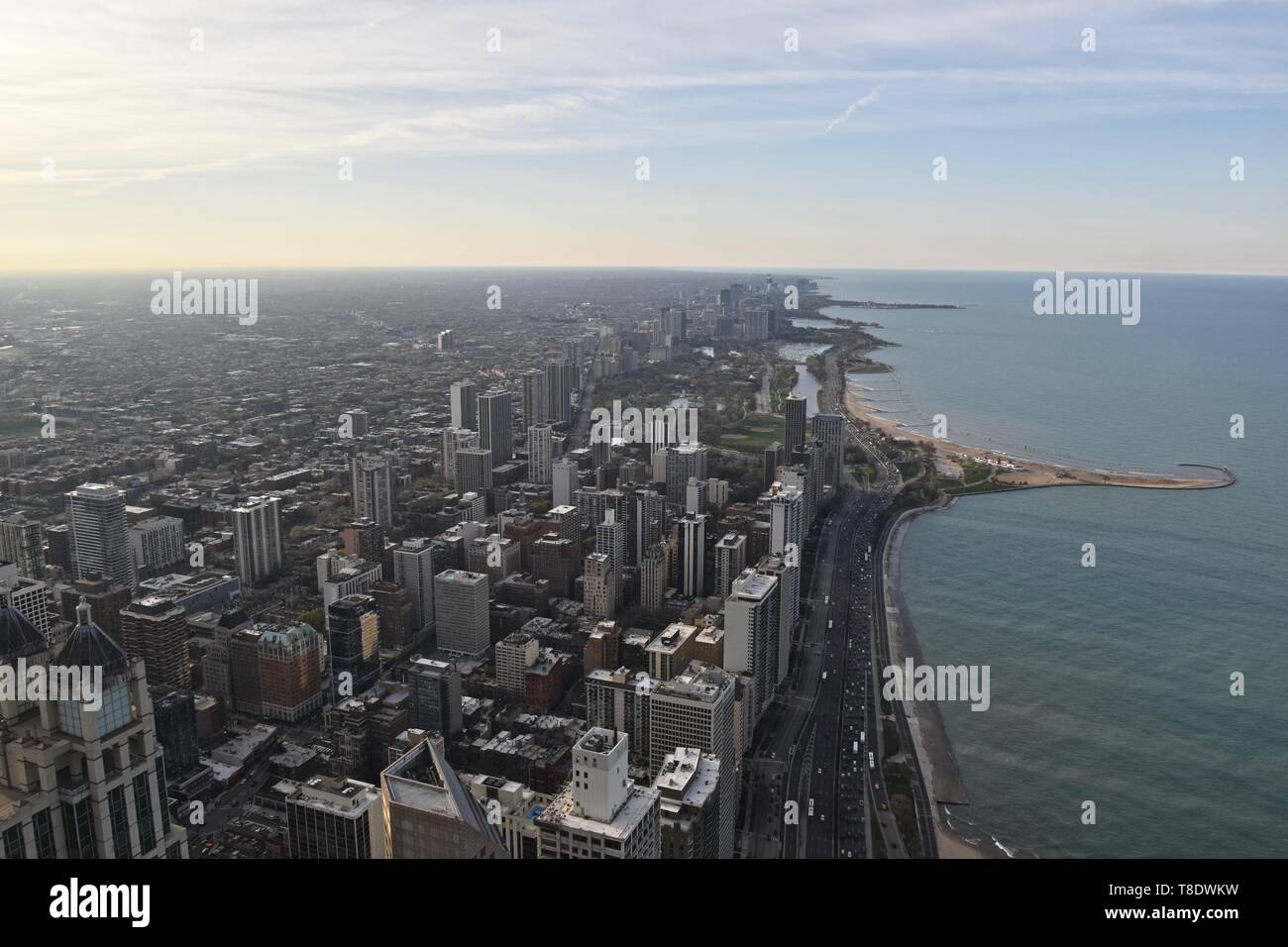 Chicago at sunset as seen from above at 360 Chicago atop the John ...