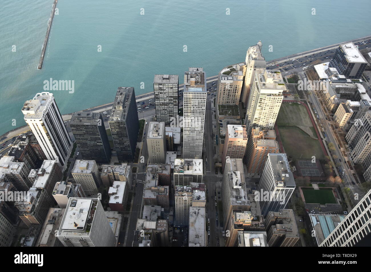 Chicago at sunset as seen from above at 360 Chicago atop the John ...